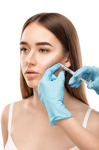 Photo Libre De Droit De Le Cosmétologue Fait Des Injections Des