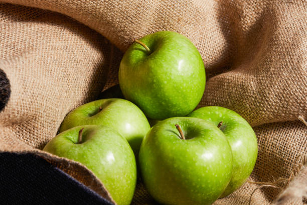 Free Stock Photo of Group of Green Apples on Red Cloth | Download Free ...