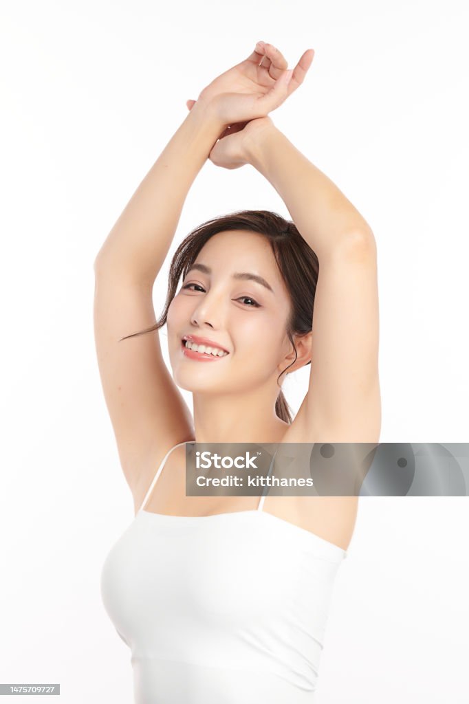 Beautiful Young Asian Woman Lifting Hands Up To Show Off Clean And
