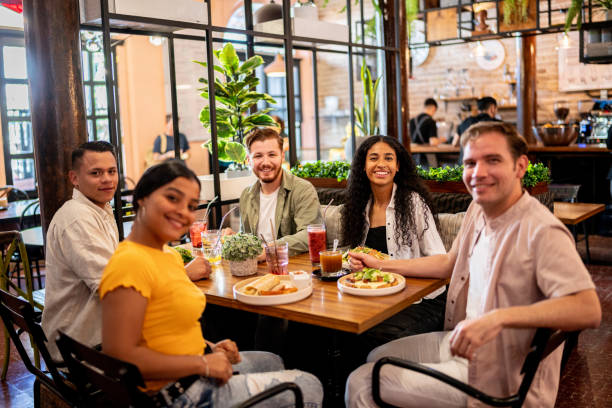 Free Stock Photo of Group of People Sitting at a Restaurant Table ...
