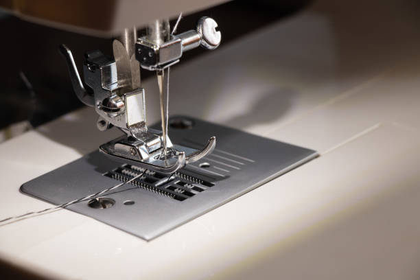 Free Stock Photo of Close Up of a Sewing Machine on a Table | Download ...