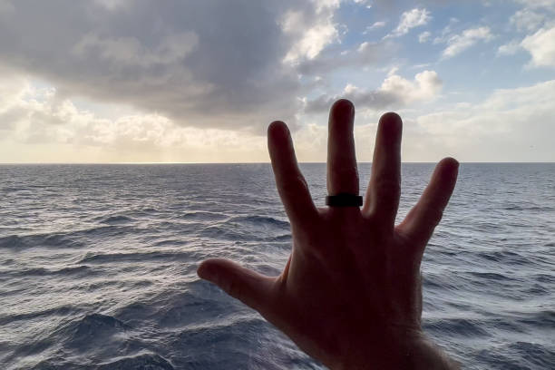 Free Stock Photo of Hand reaching towards the ocean horizon | Download ...