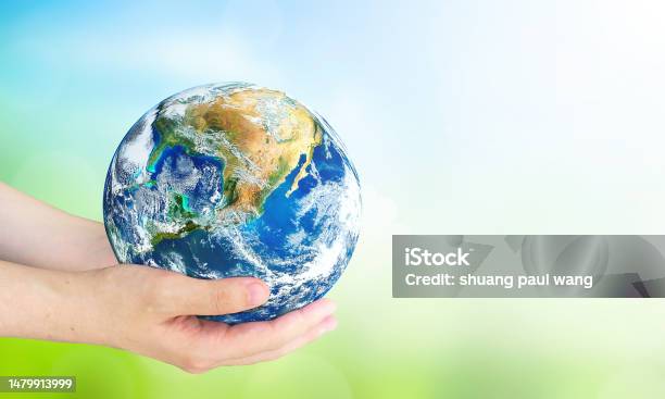 World Environment And Earth Day Human Hands Holding Earth Globe Over