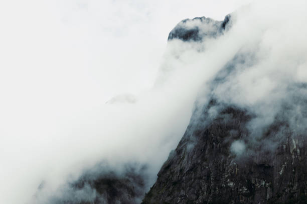 Free Stock Photo of Misty mountain rock face engulfed in fog | Download ...