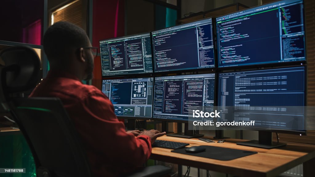 Black Cyber Security Specialist Coding On Desktop Computer With Six