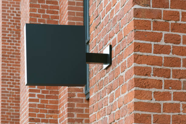Free Stock Photo of Red Brick Wall With Black Square Sign | Download ...