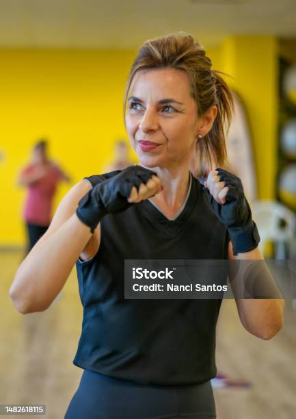Young Athlete Woman In A Gym Class Preparing Her Body To Show Off A Nice Body In Summer Stock