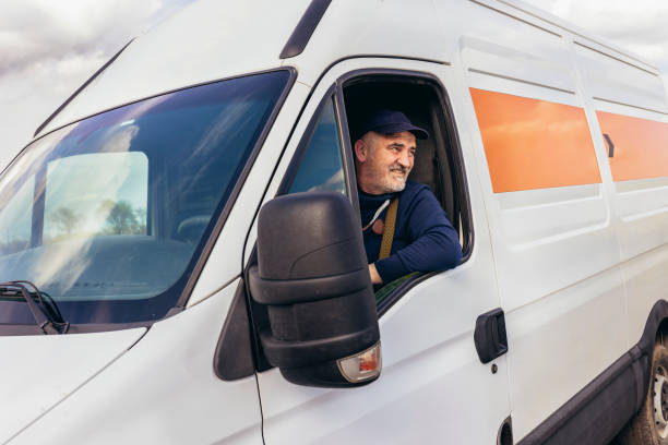 Free Stock Photo of Man looking out of van window | Download Free ...