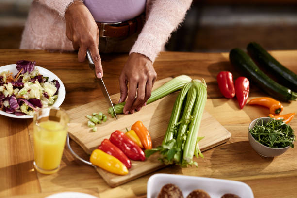 Free Stock Photo of Person Cutting Up Vegetables on Cutting Board ...