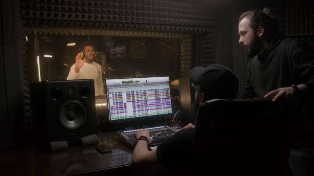 Free Stock Photo of Man Operating Sound Board in Recording Studio ...