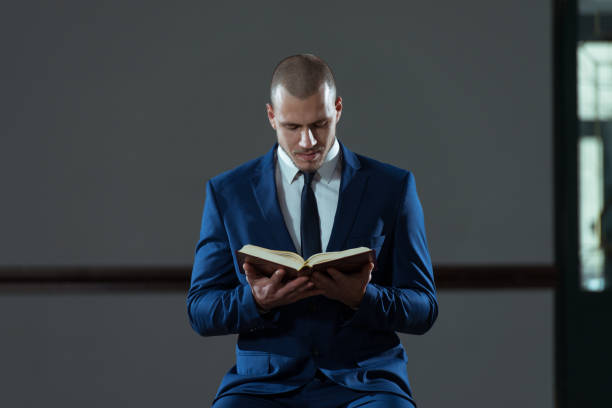 Free Stock Photo of Man Standing in the Dark Reading a Book | Download ...