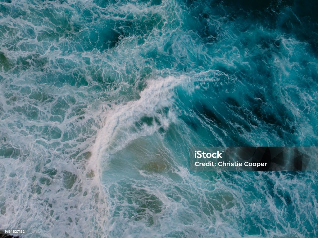 Breaking Waves Birds Eye View Of Waves Crashing With Rough Seas At