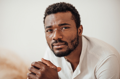 Portrait Of Candid Authentic Handsome Dark Skinned Man Posing At Home
