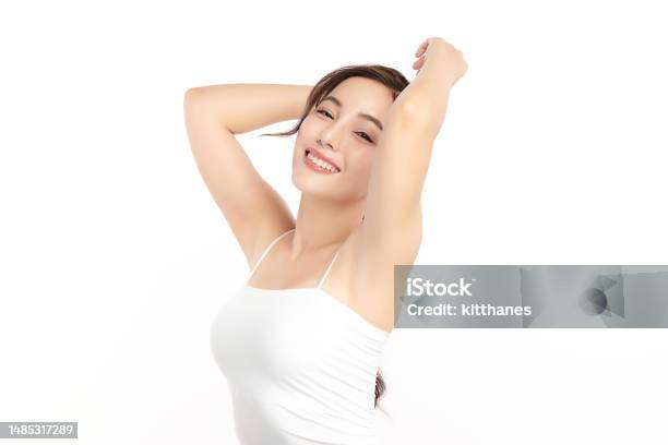 Beautiful Young Asian Woman Lifting Hands Up To Show Off Clean And
