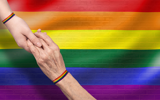 Bendera Lgbt Gerakan Tangan Pada Latar Belakang Pelangi Closeup Tangan