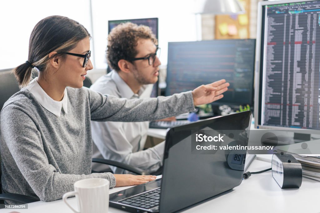 Software Programmers Analyzing Html Code And Database Brainstorming Script Ideas To Develop New