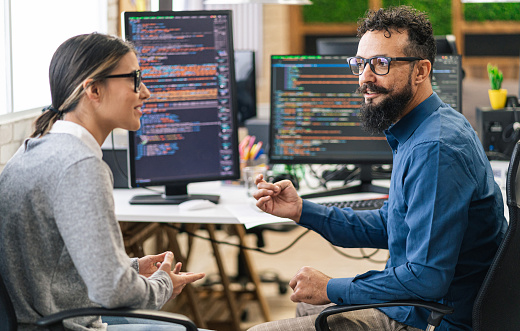 Software Programmers Analyzing Html Code And Database Brainstorming Script Ideas To Develop New