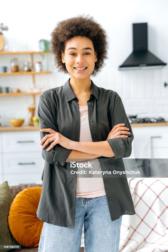 Vertical Photo Of A Lovely Positive Stylish Curly Haired African
