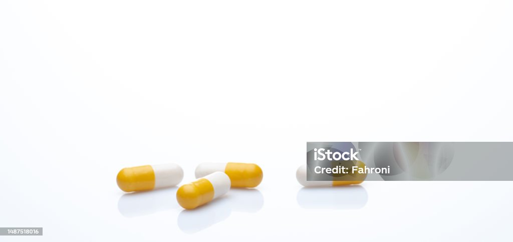 Yellowwhite Probiotic Capsule Pill On White Background Probiotic ... Yellowwhite Probiotic Capsule Pill On White Background Probiotic ...