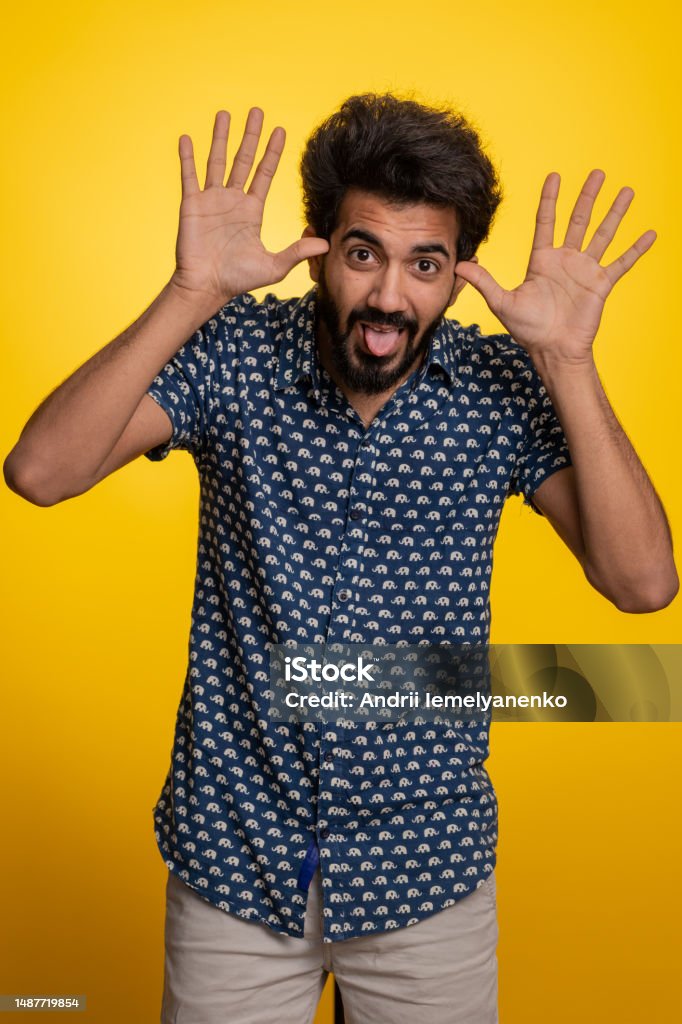Comical Funny Indian Man Making Playful Silly Facial Expressions