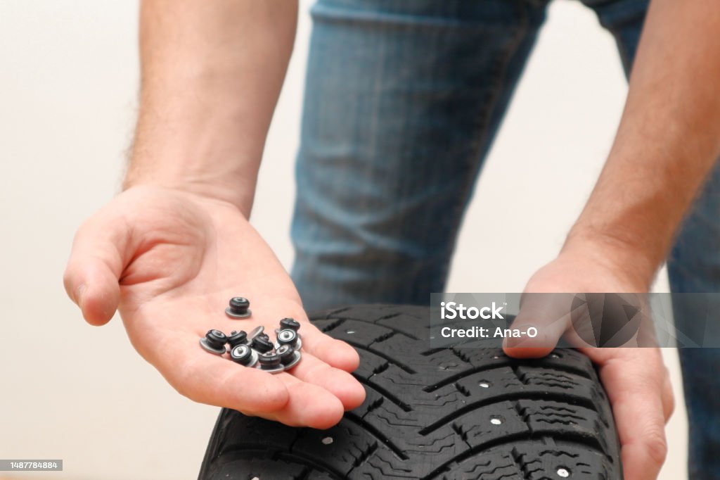 Hand With Repair Steal Studs Worn Tire Tread Winter Studded Tire Wheel ... Hand With Repair Steal Studs Worn Tire Tread Winter Studded Tire Wheel ...