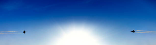 Free Stock Photo of Two Blue Fighter Jets Flying Through a Blue Sky ...