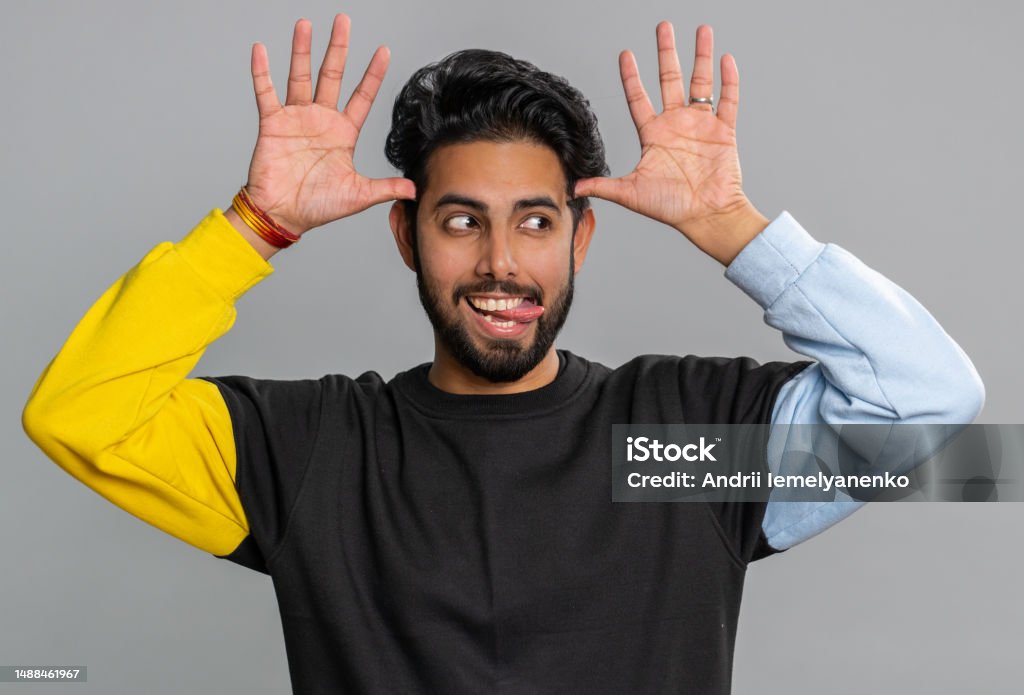 Comical Funny Indian Man Making Playful Silly Facial Expressions