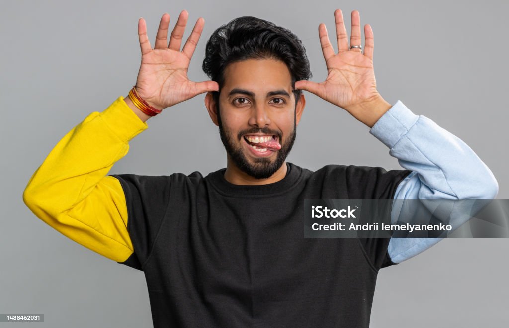 Comical Funny Indian Man Making Playful Silly Facial Expressions