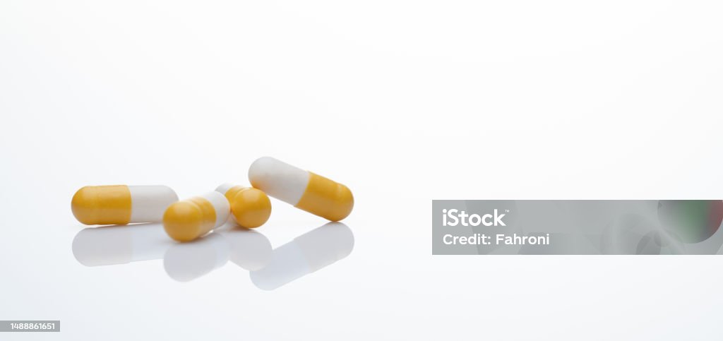 Yellowwhite Probiotic Capsule Pill On White Background Probiotic ... Yellowwhite Probiotic Capsule Pill On White Background Probiotic ...