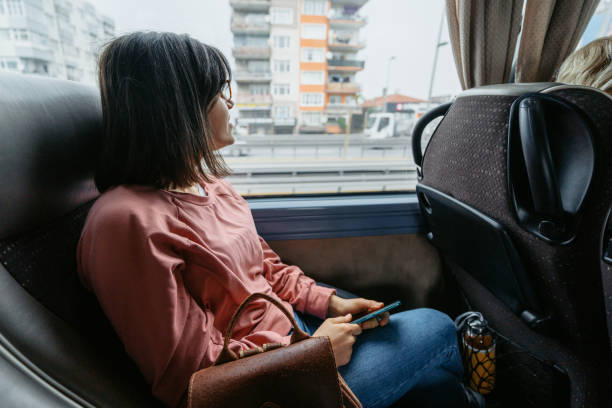 Free Stock Photo of Woman Sitting in Bus Looking Out the Window ...
