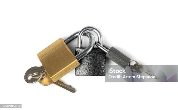 Three Closed Locks Isolated Golden And Black Padlocks Locked Together