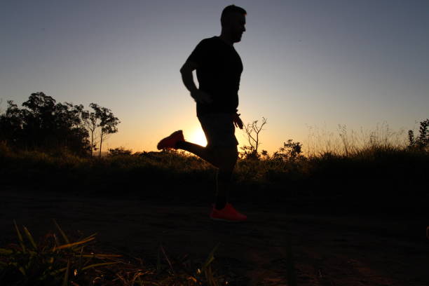 Free Stock Photo of Silhouette of a man running towards the sunset ...