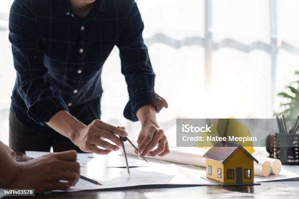 Engineer Team Planning Design House Modifying Plan Creating ... Engineer Team Planning Design House Modifying Plan Creating ...