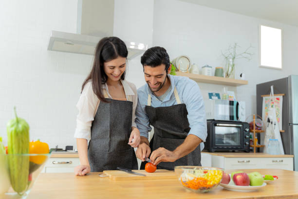 Free Stock Photo of Couple having fun while cooking together | Download ...