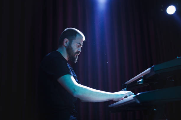 Free Stock Photo of Person Playing Keyboard in Front of Microphones ...