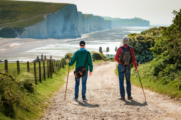 Free Stock Photo of Two people hiking on a coastal trail | Download ...