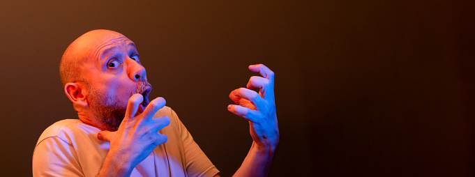 Happy Bald Bearded Man Making Funny Hand Gestures Concept Of Strength