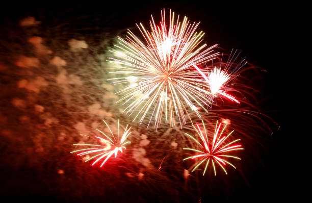 Free Stock Photo of Fireworks Illuminating Night Sky Over Water ...