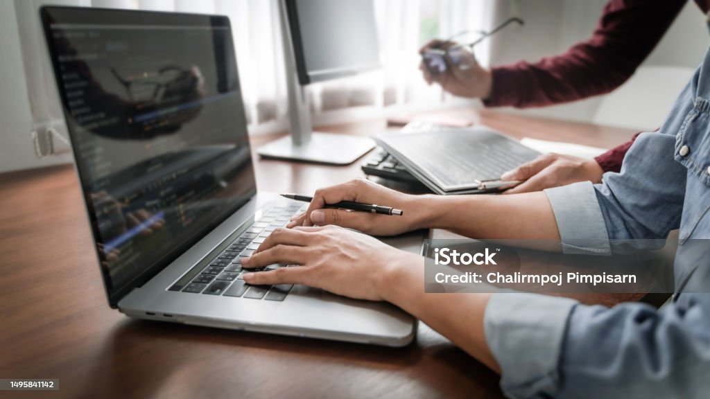 Programming Developing Software Application Programmer Writing Program Code With Two Monitors