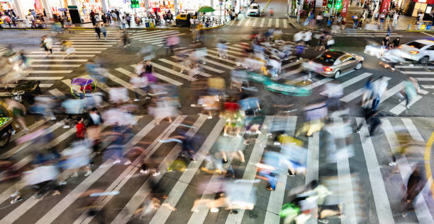 Free Stock Photo of Large Group of People Walking Down Busy City Street ...
