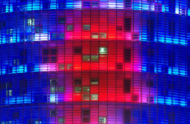 Free Stock Photo of Neon Lights Reflected in Glass Building at Night ...