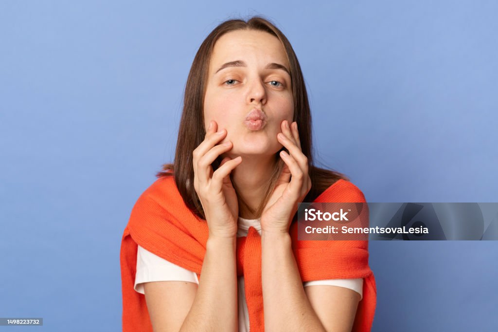 Romantic Woman Wearing White Tshirt And Jumper Over Neck Standing