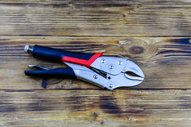 Free picture: Rusty cast iron pliers on a table