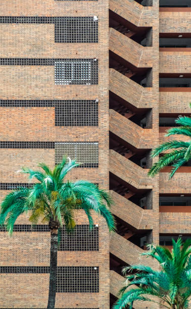 Free Stock Photo of Red Brick Building With Palm Trees | Download Free ...