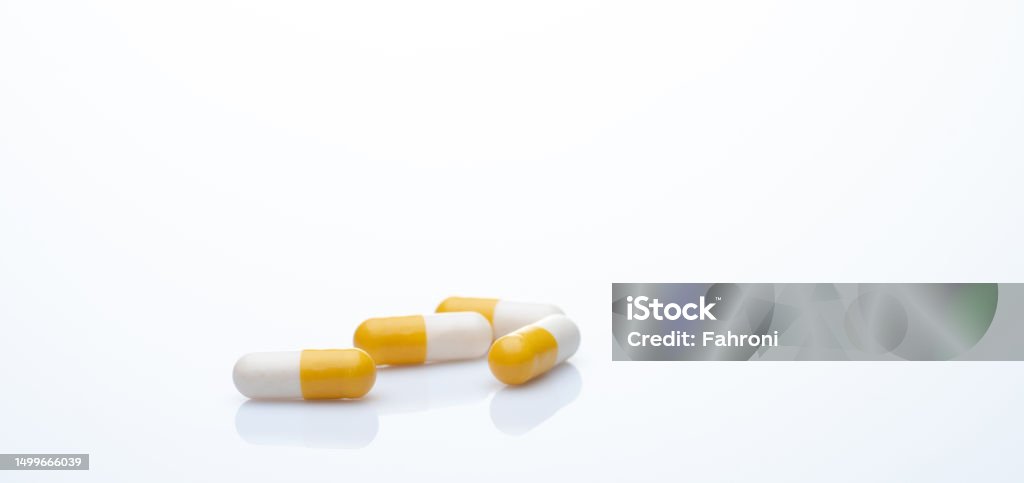 Yellowwhite Probiotic Capsule Pill On White Background Probiotic ... Yellowwhite Probiotic Capsule Pill On White Background Probiotic ...