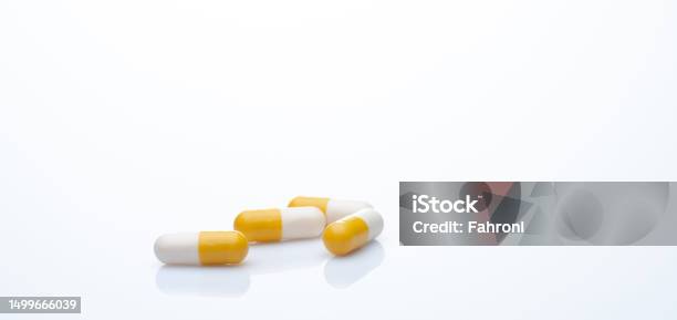 Yellowwhite Probiotic Capsule Pill On White Background Probiotic ... Yellowwhite Probiotic Capsule Pill On White Background Probiotic ...