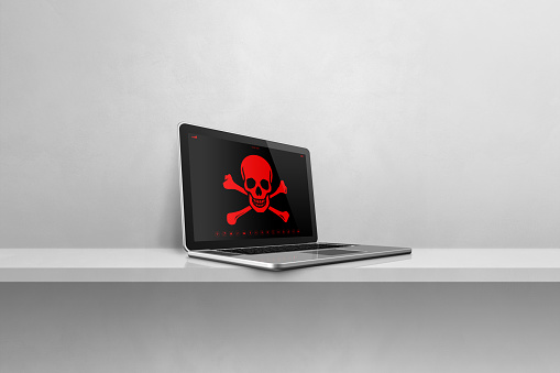 Laptop Di Rak Dengan Simbol Bajak Laut Di Layar Konsep Peretasan Foto