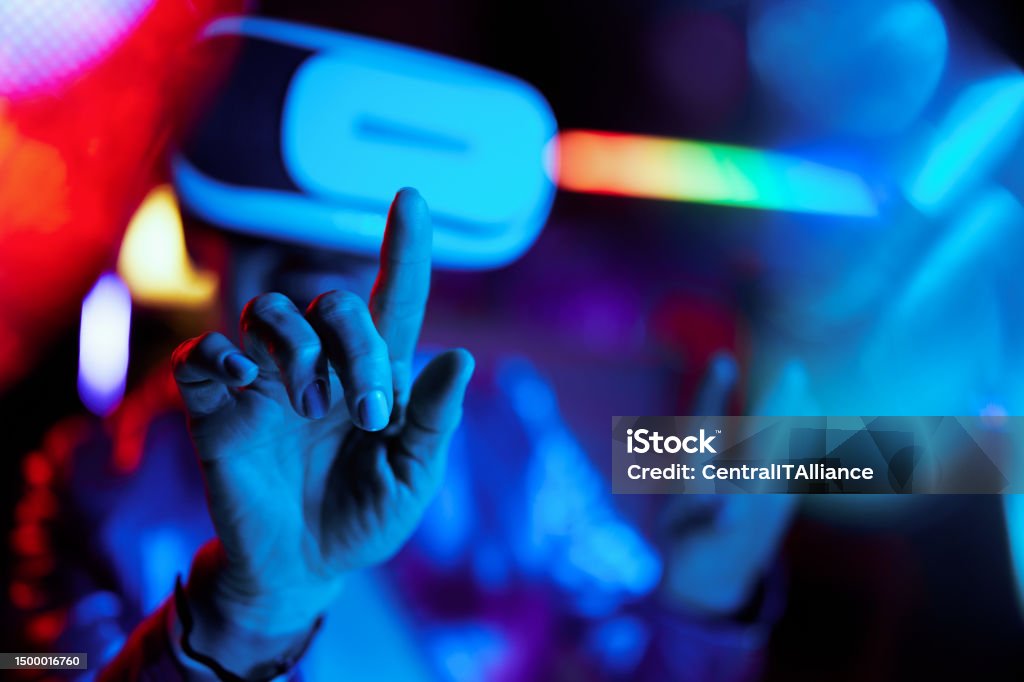 Stylish Woman In Virtual Reality Goggles Exploring Metaverse Stock ... Stylish Woman In Virtual Reality Goggles Exploring Metaverse Stock ...