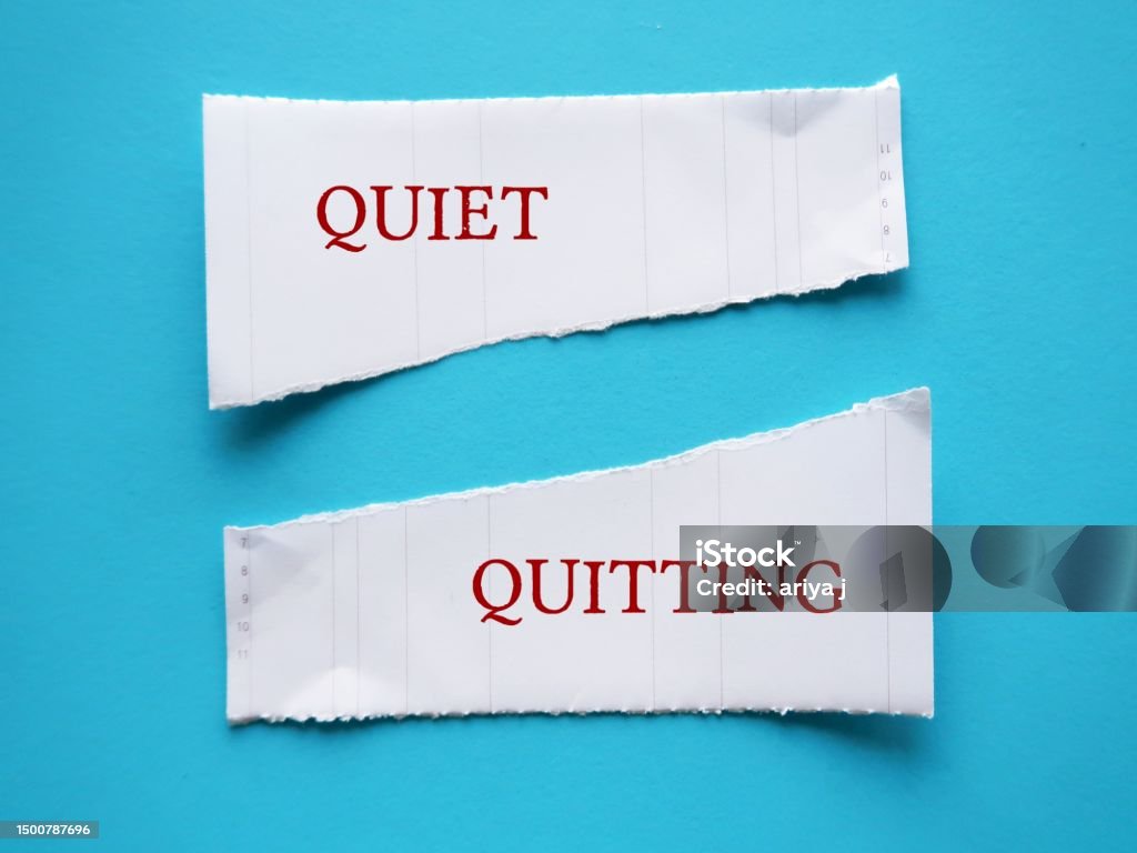 Torn Paper On Blue Background With Text Written Quiet Quitting Trend Of