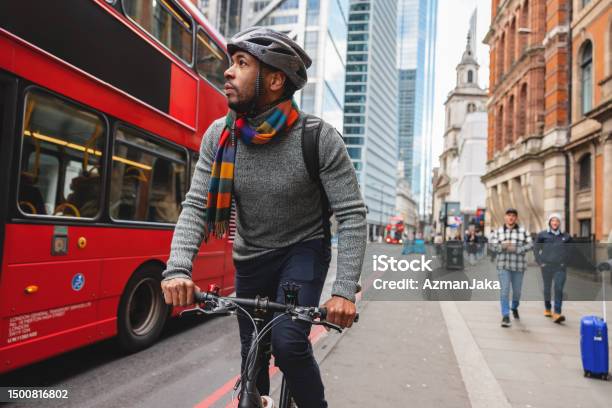 Adult Black Male Admiring The Architecture While Cycling On A City ... Adult Black Male Admiring The Architecture While Cycling On A City ...